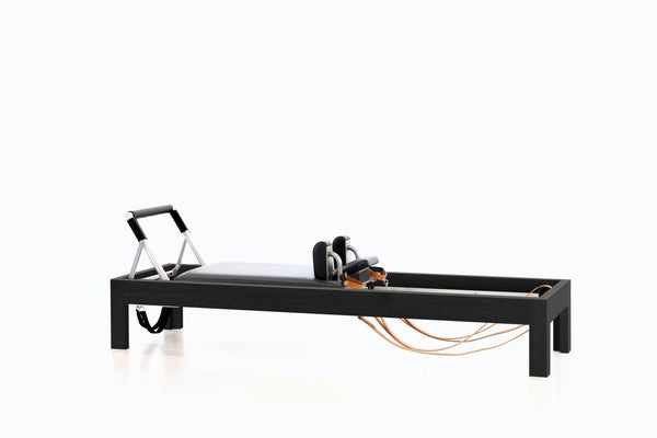 Pilates Reformer Machine | Benefits, Using Resistance - Training Station